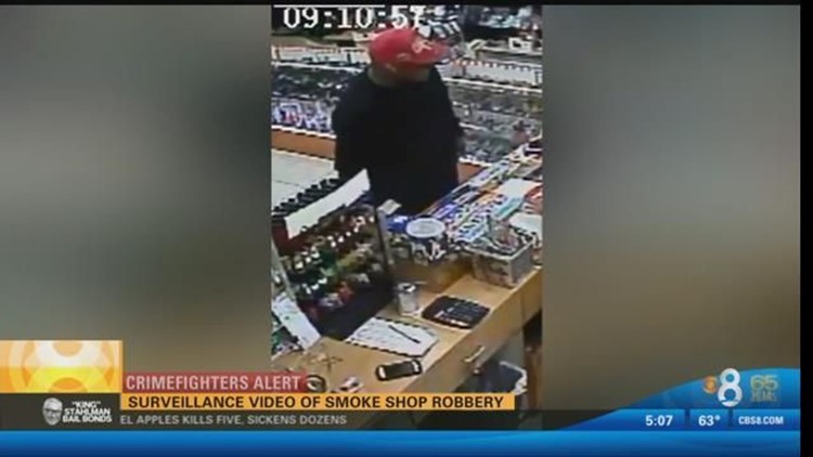 Surveillance video of smoke shop robbery | cbs8.com