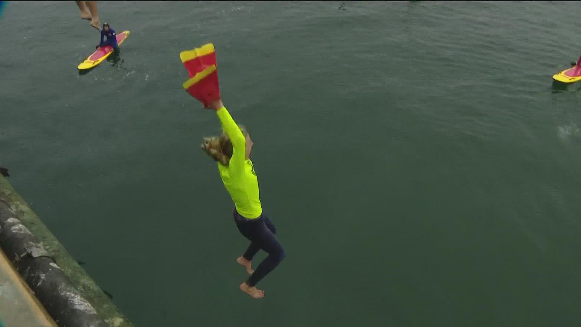 Junior Lifeguards jumping off Ocean Beach Pier to raise money for a ...