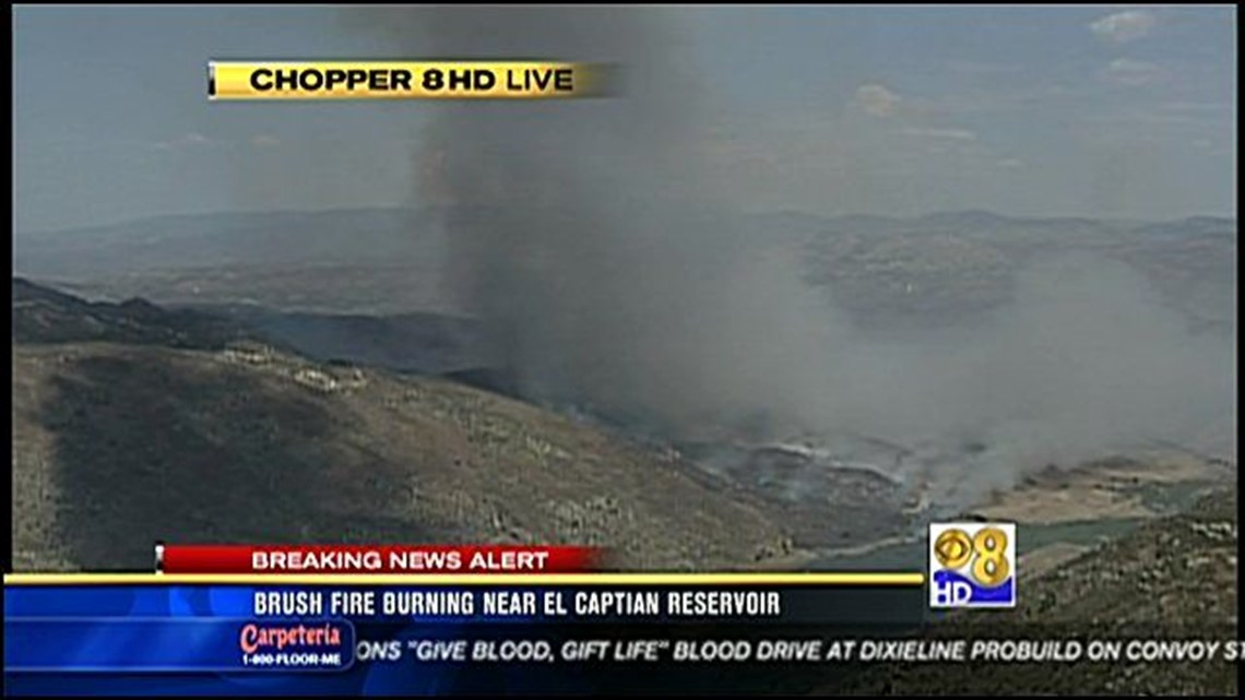 Aerial attack quenches brush fire near El Capitan Reservoir | cbs8.com