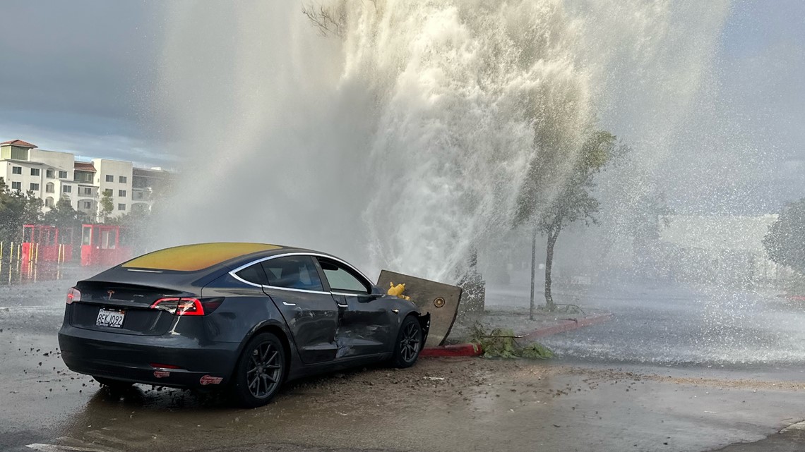Tesla crashes into fire hydrant outside Eastlake Chick-fil-A | cbs8.com