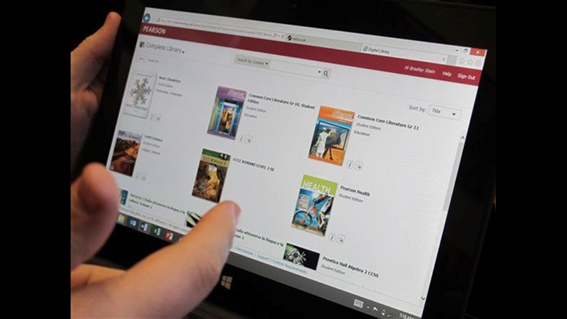 NY school all-in on trend of all-digital textbooks | cbs8.com