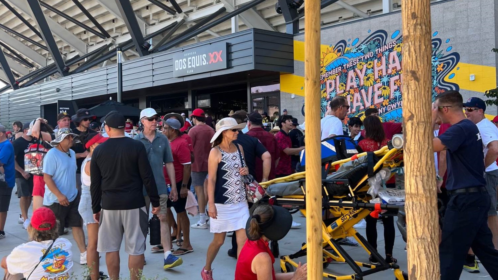 Fans experience extreme heat at Snapdragon Stadium opening day | cbs8.com