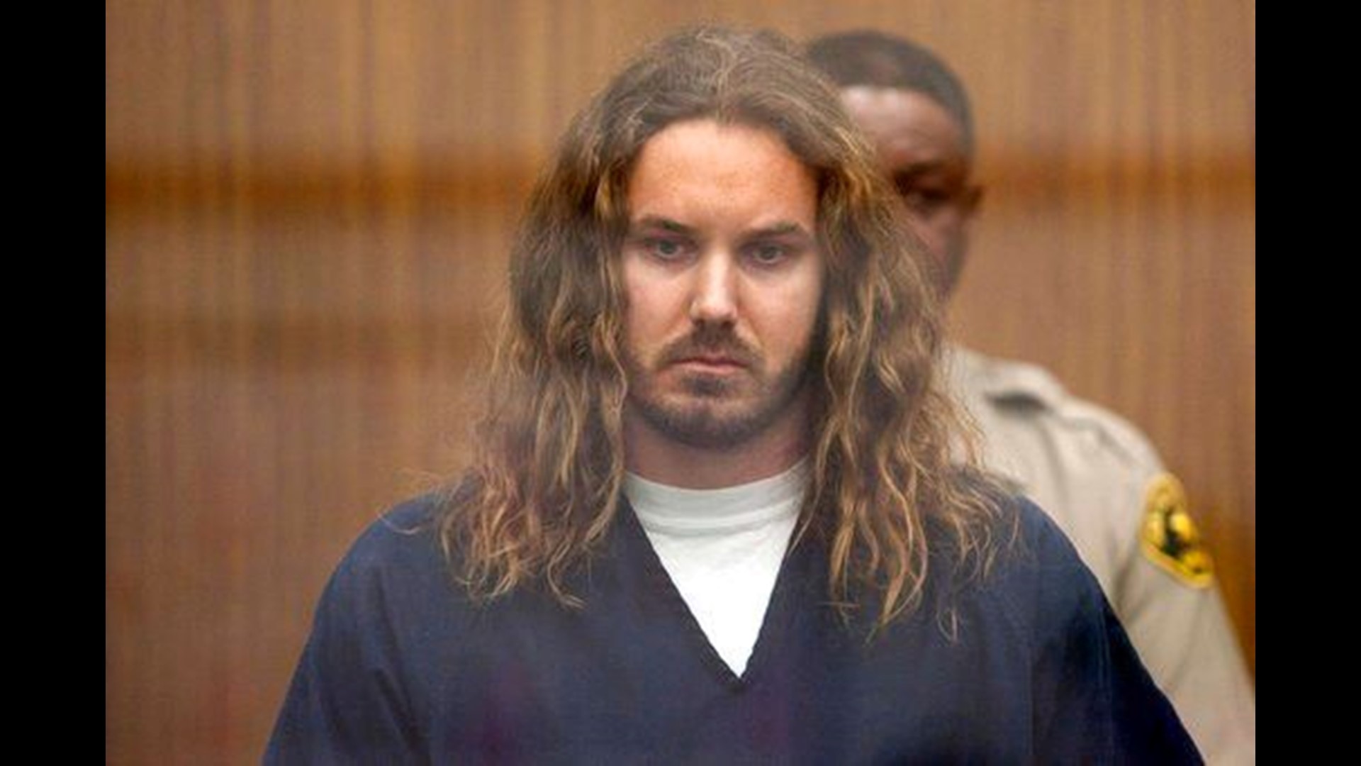 Metal singer jailed in wife's murder plot back with band | cbs8.com