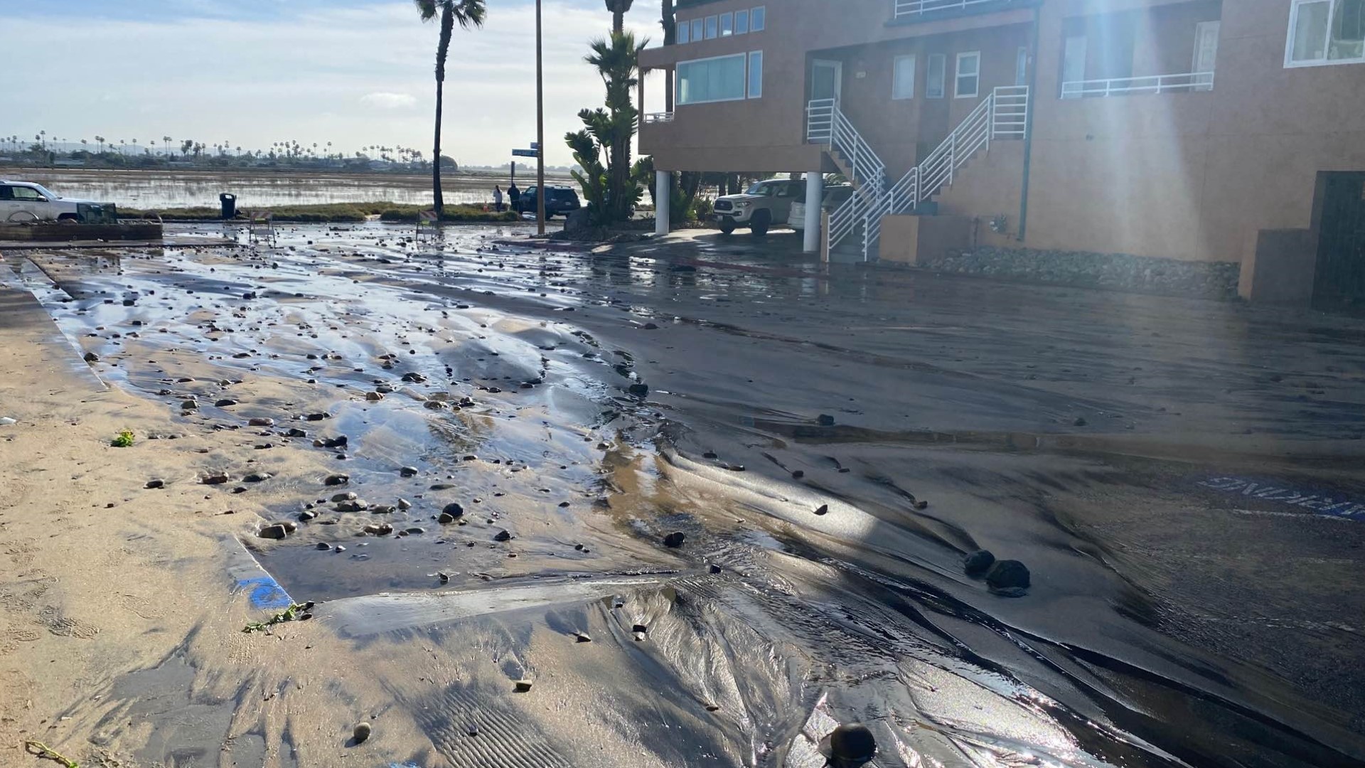 Rushing waves flood coastal areas of San Diego County after a powerful ...
