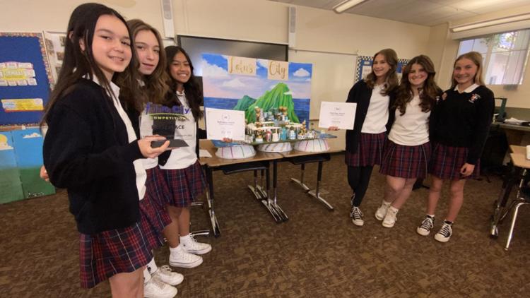 8th grade STEM team designs city of the future to solve climate change ...