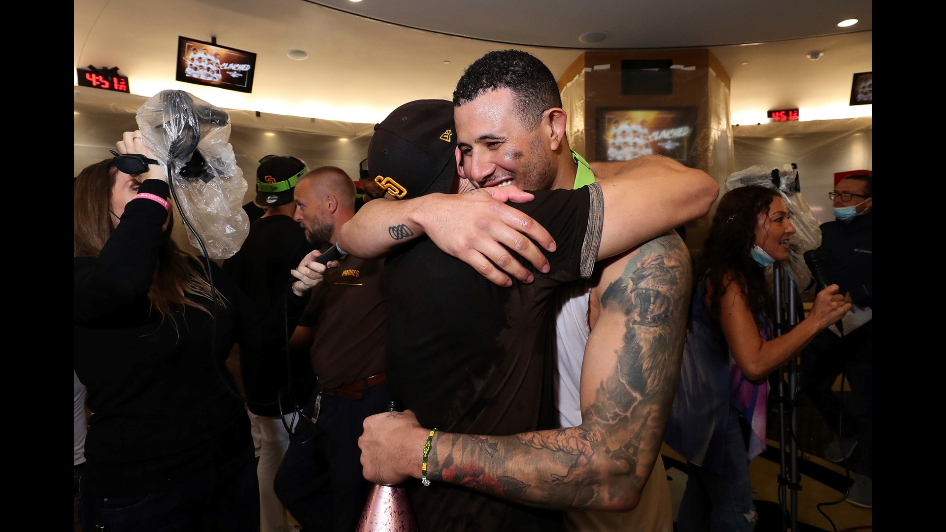 San Diego Padres party in clubhouse after clinching playoff spot | cbs8.com