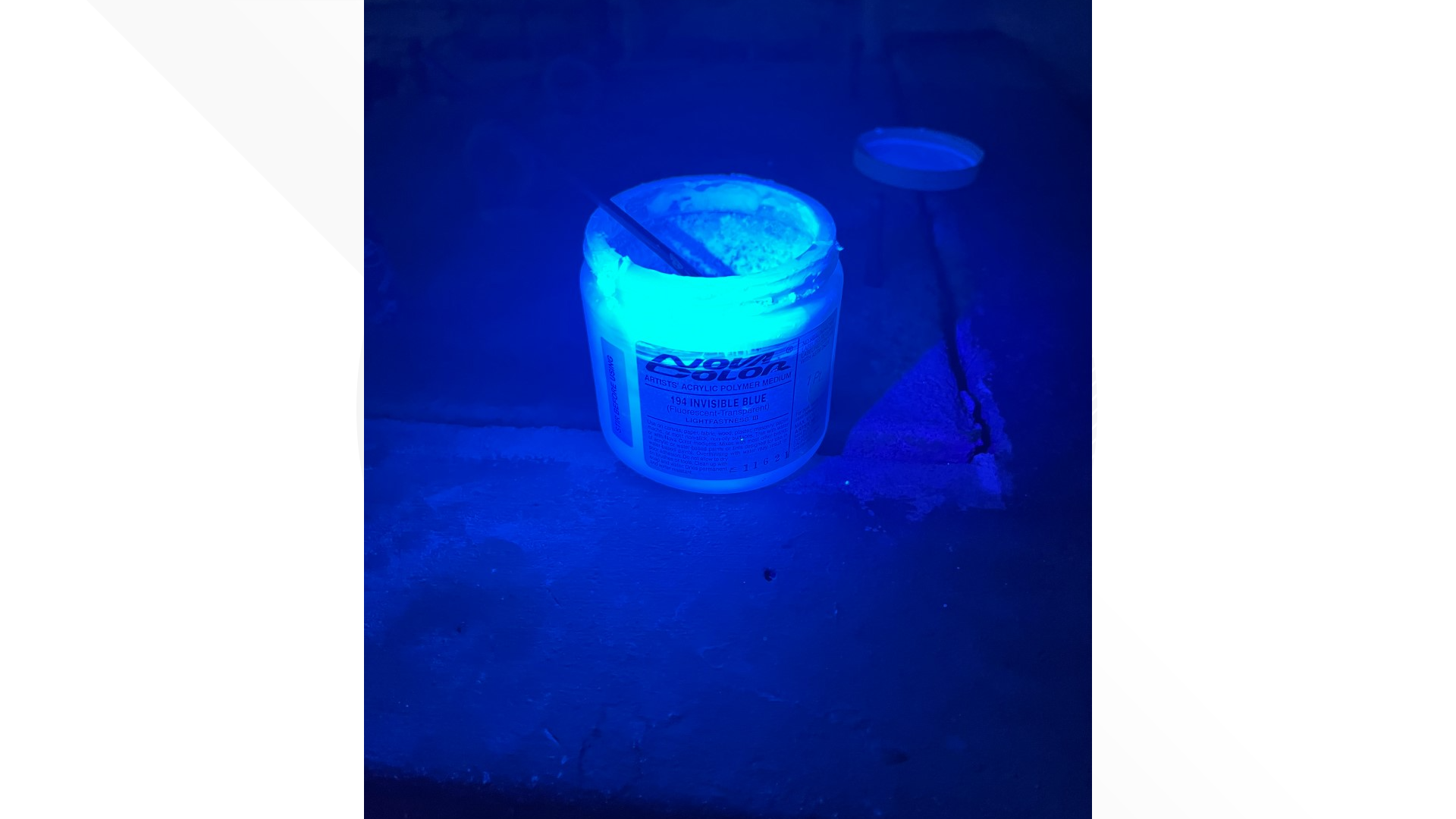 Glow in the dark invisible paint mural lights up the night in Normal ...