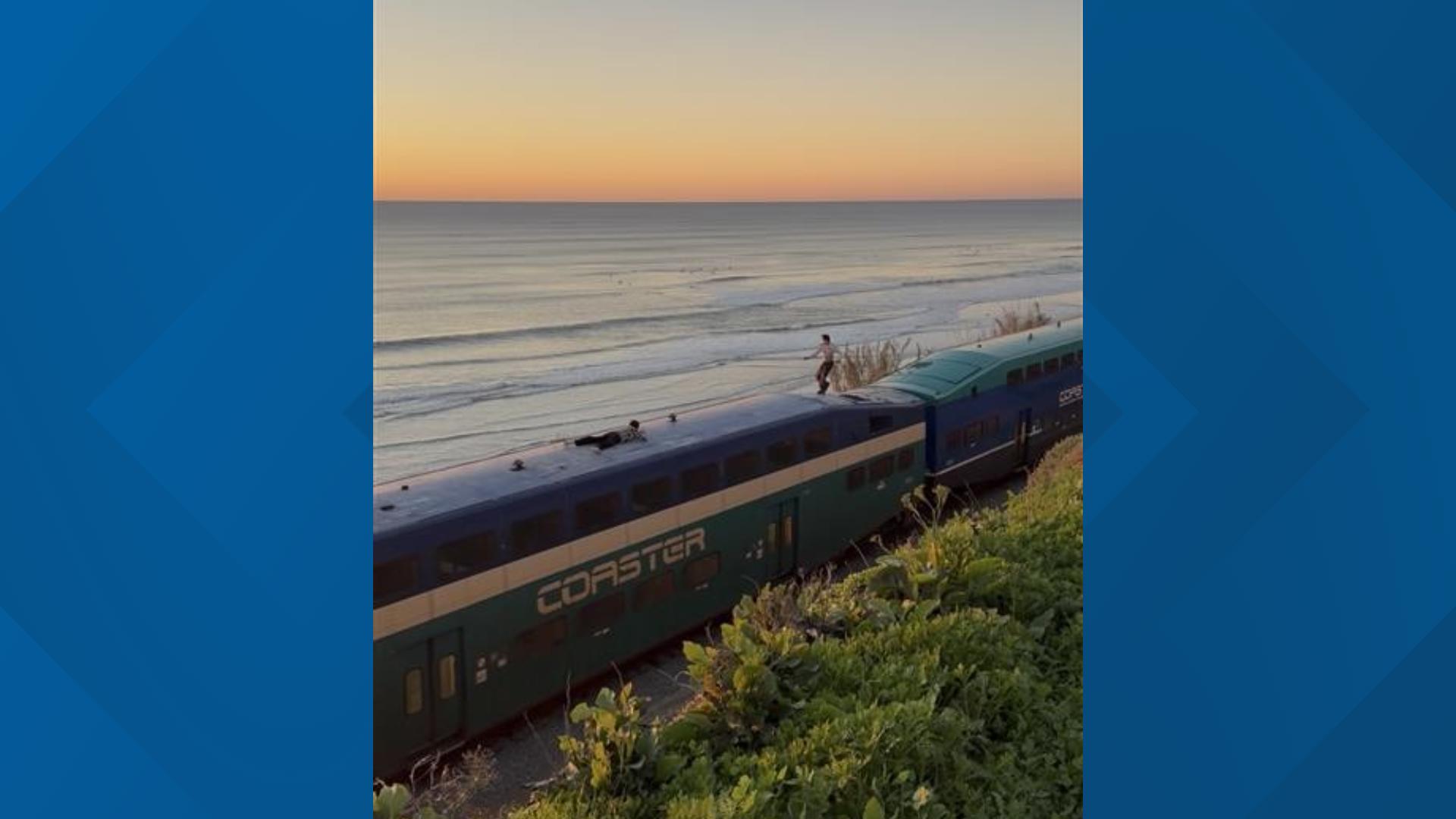 Video shows 2 people on top of a moving Coaster train near Del Mar ...