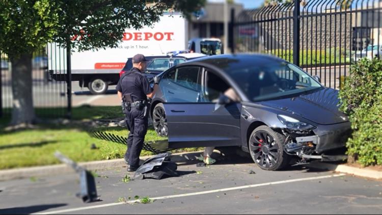 Caught on Camera: Tesla plows through CBS 8 parking lot fence | cbs8.com