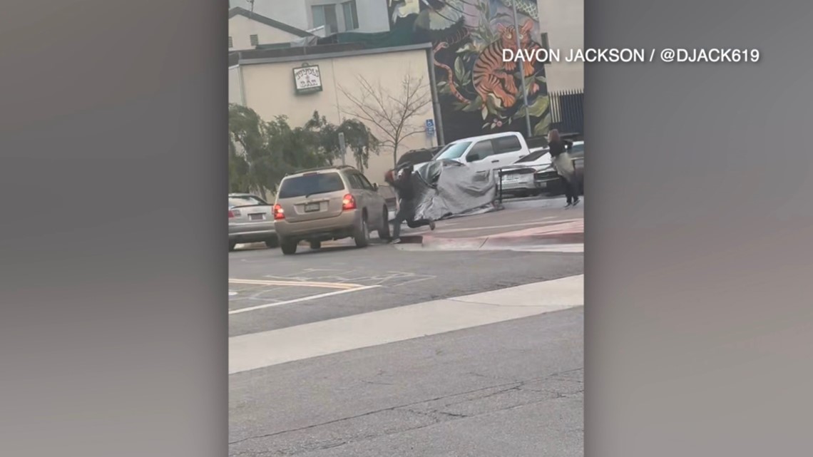 Driver tries to run over bat-wielding man in Downtown San Diego | cbs8.com