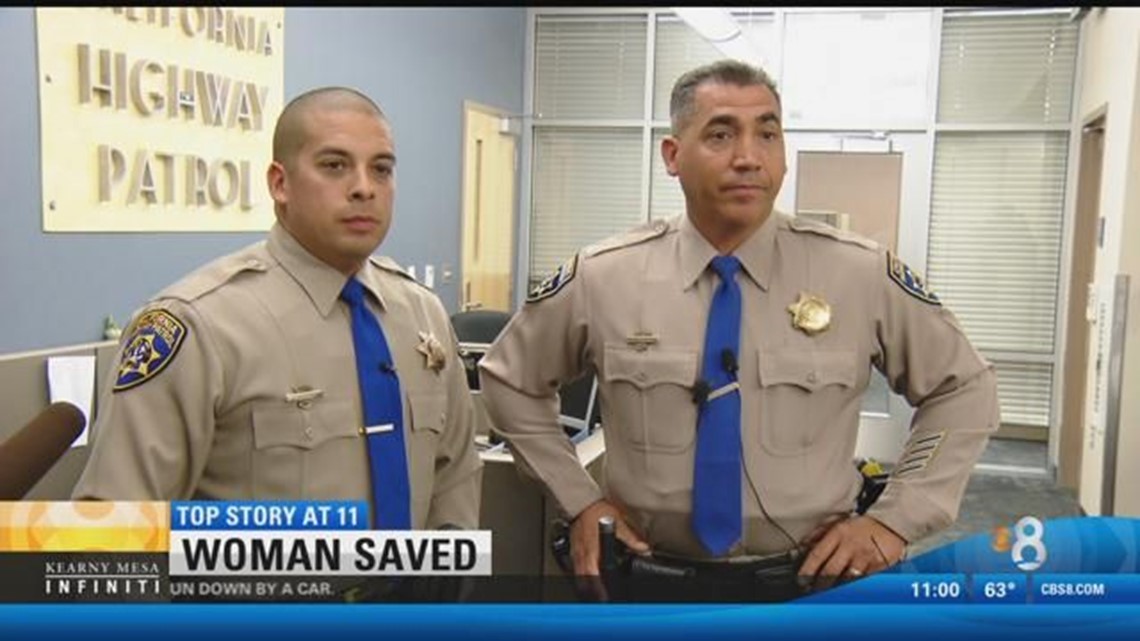 CHP officers put own lives at risk to save woman from overpass | cbs8.com