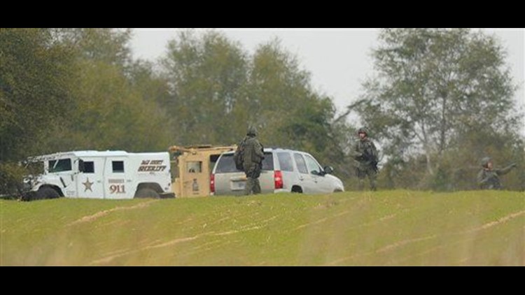 Authorities storm Alabama bunker, rescue young boy | cbs8.com