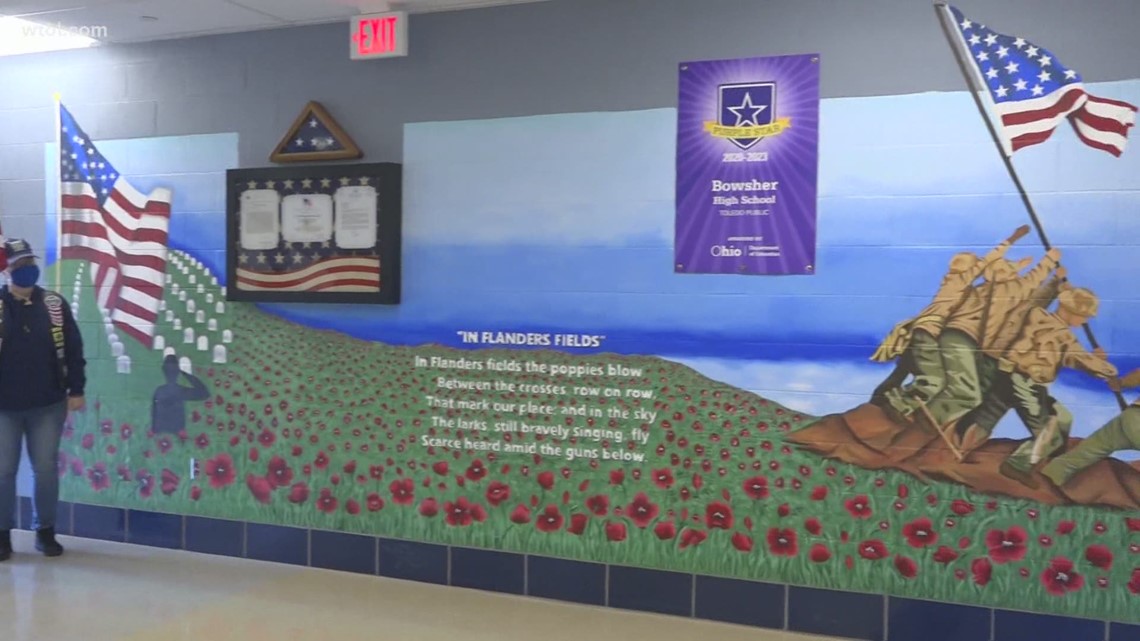 Bowsher High School unveils new military mural | cbs8.com